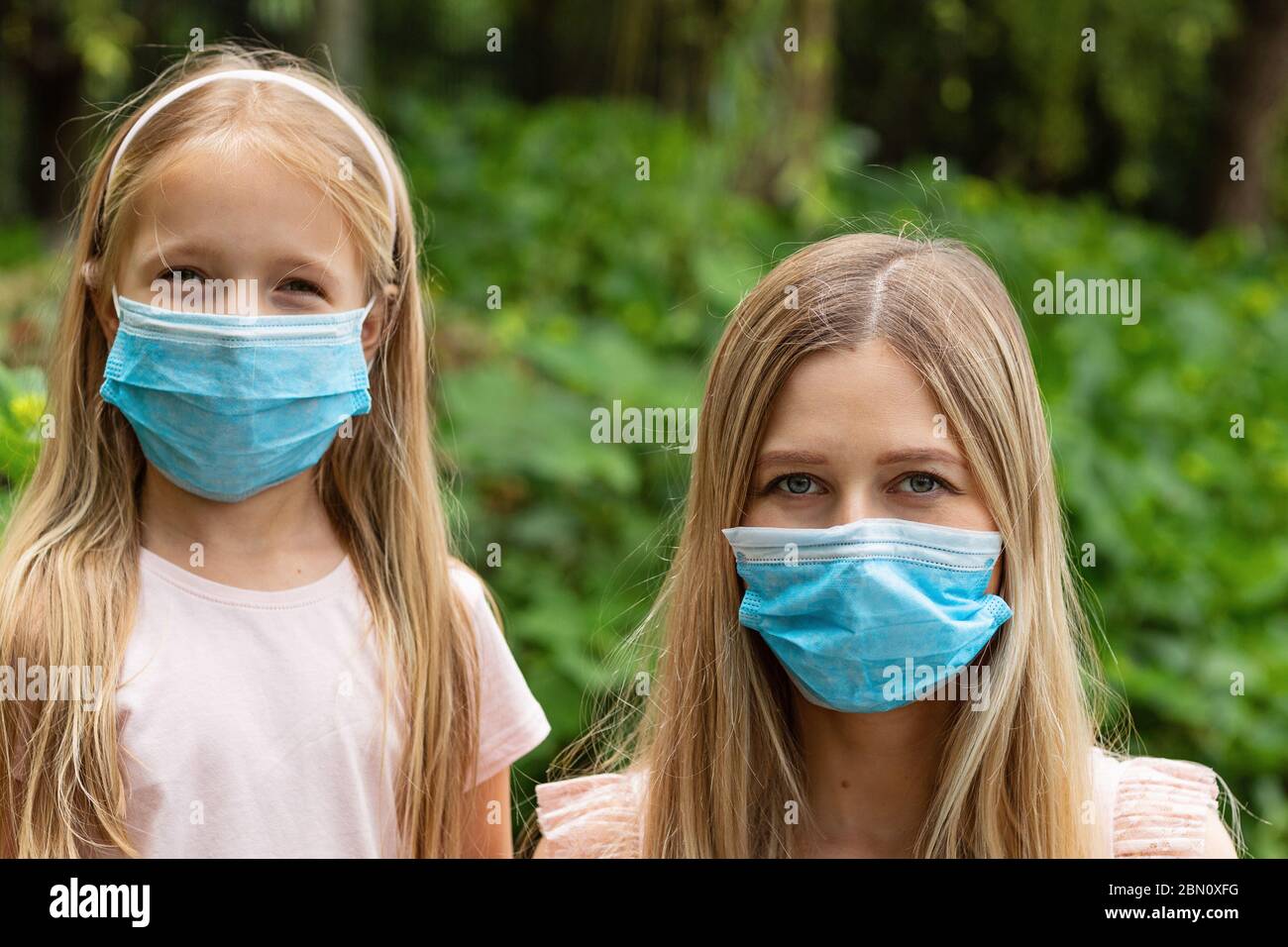 Happy people take off protective medical mask from face outdoors ...