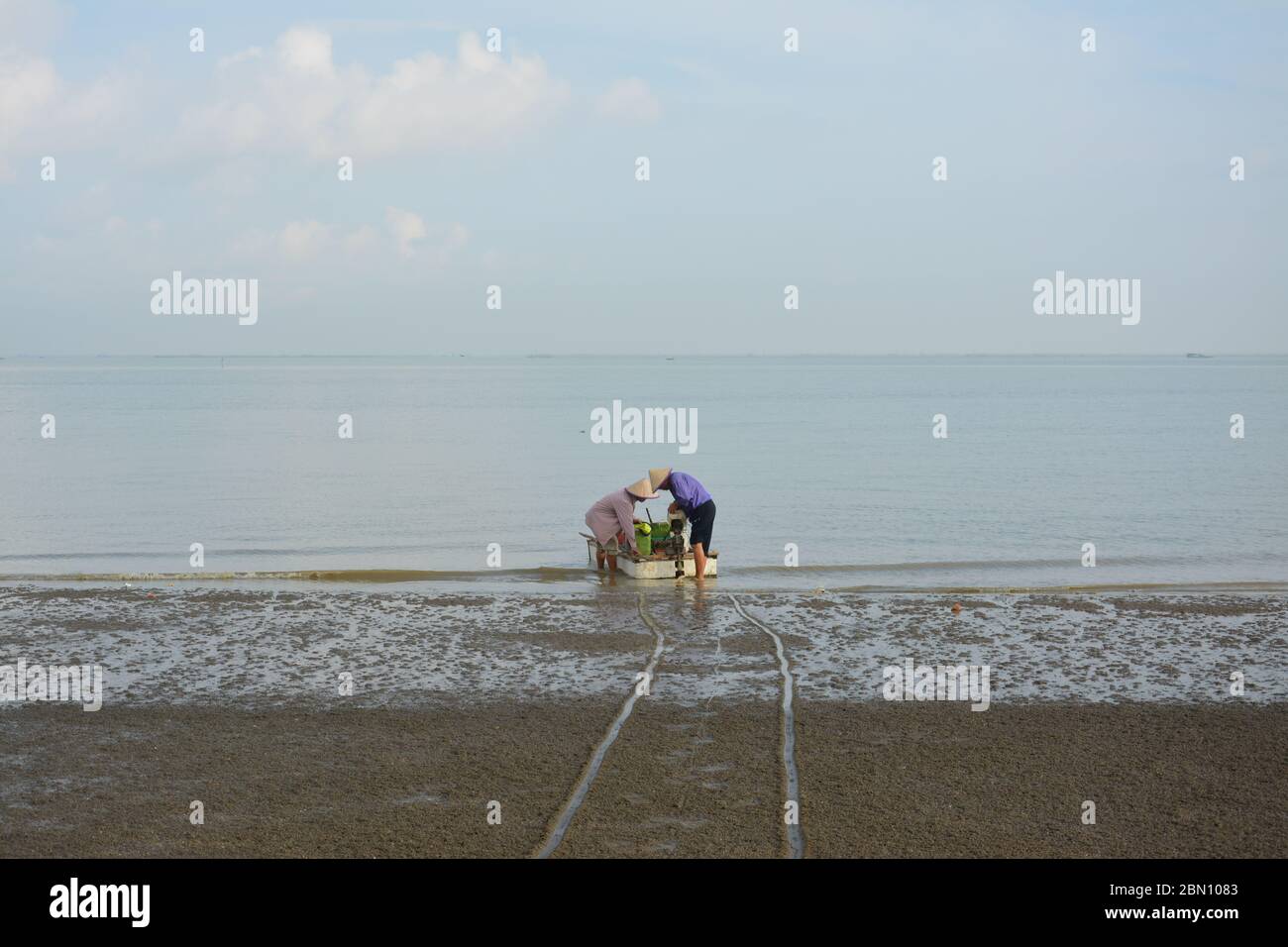 Preparing The Beach For Summer With Sand High Resolution Stock ...