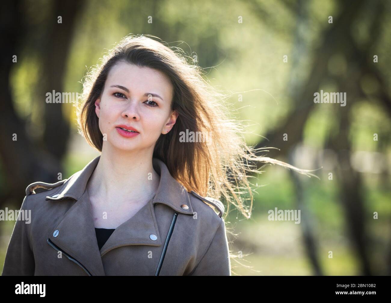 Portrait of girl in the park hi-res stock photography and images - Alamy