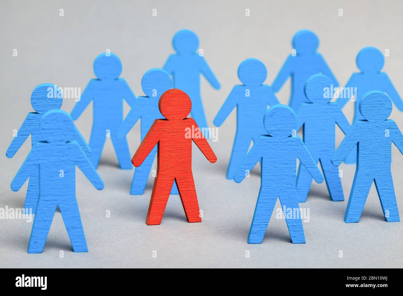 Team Leader. HR. The right choice of staff. Blue men and red leader ...