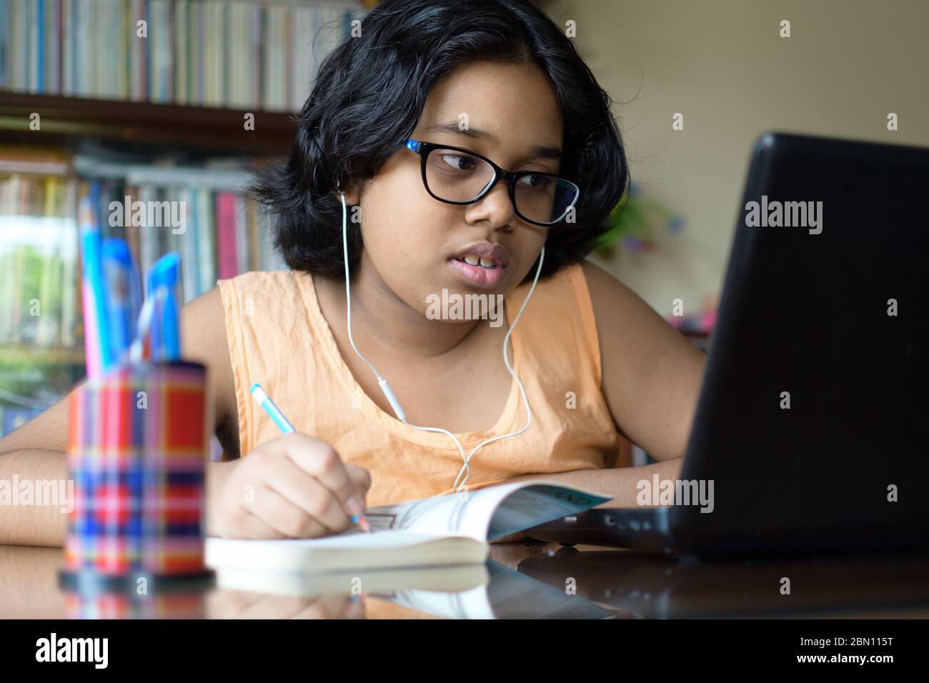 Indian School girl is attending her online class during her stay at ...