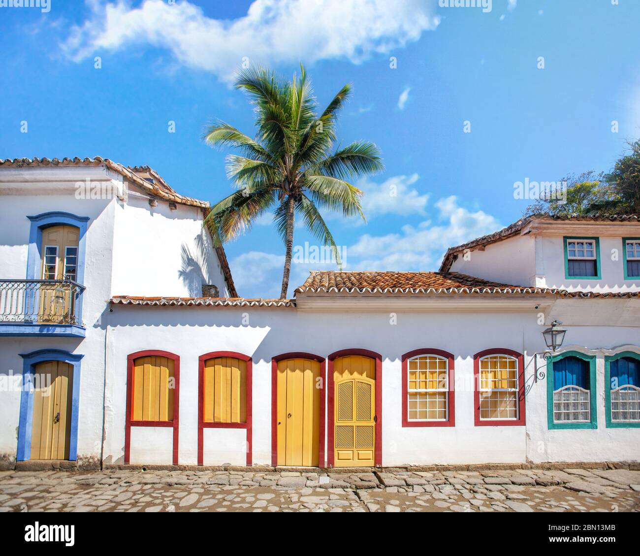Street and old portuguese colonial houses in historic downtown in ...