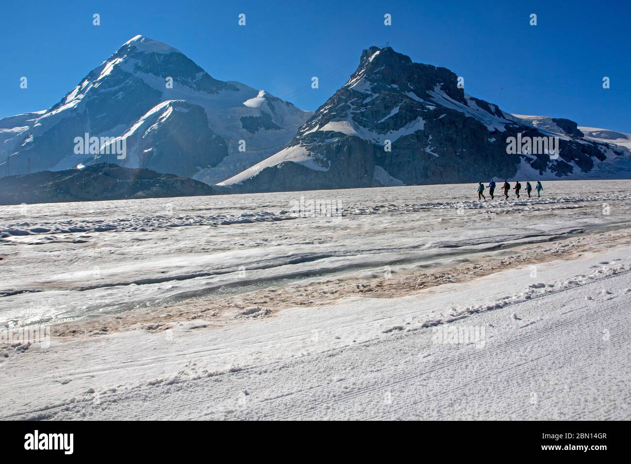 Hikers on Teodulo Glacier Stock Photo - Alamy