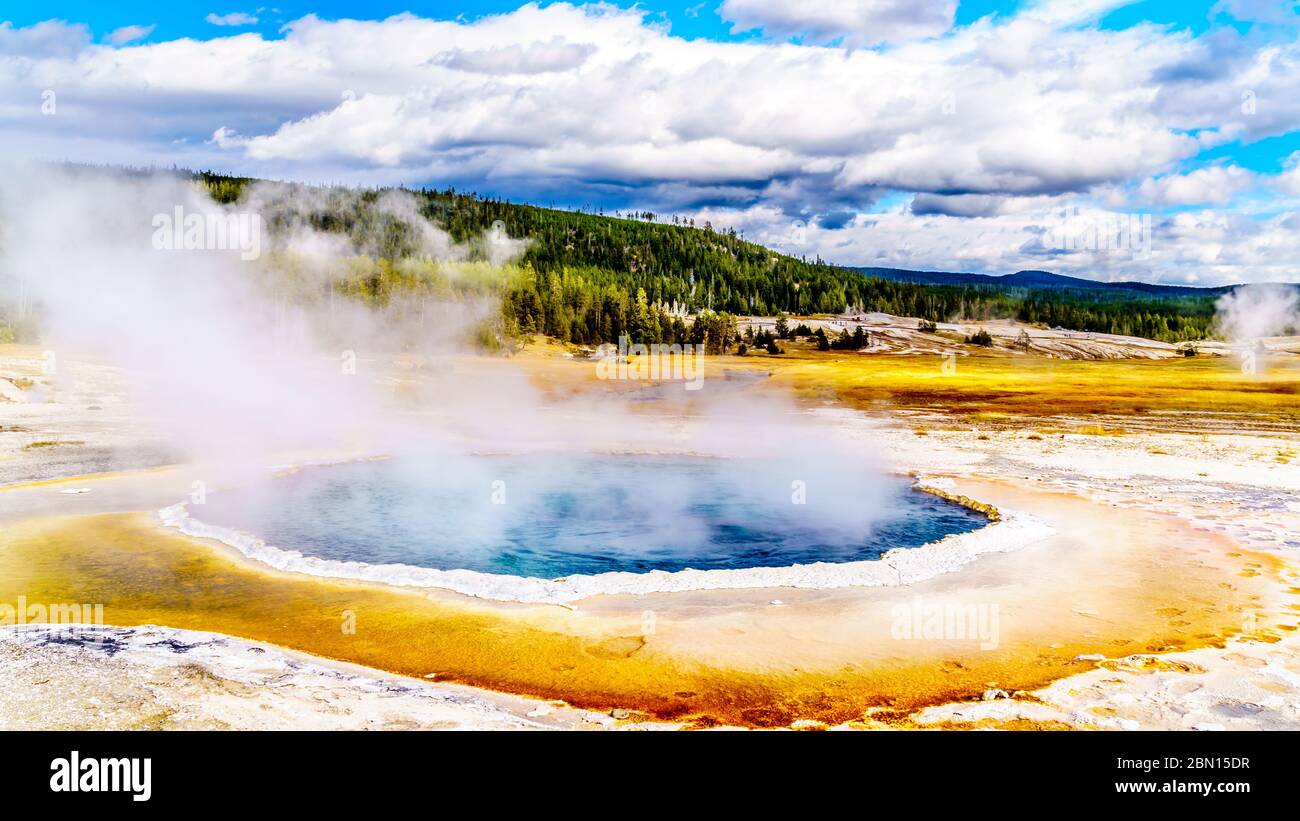Steam coming out of the Crested Pool in the Upper Geyser Basin along ...