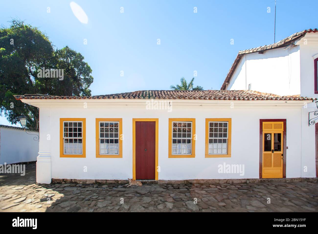 Street and old portuguese colonial houses in historic downtown in ...