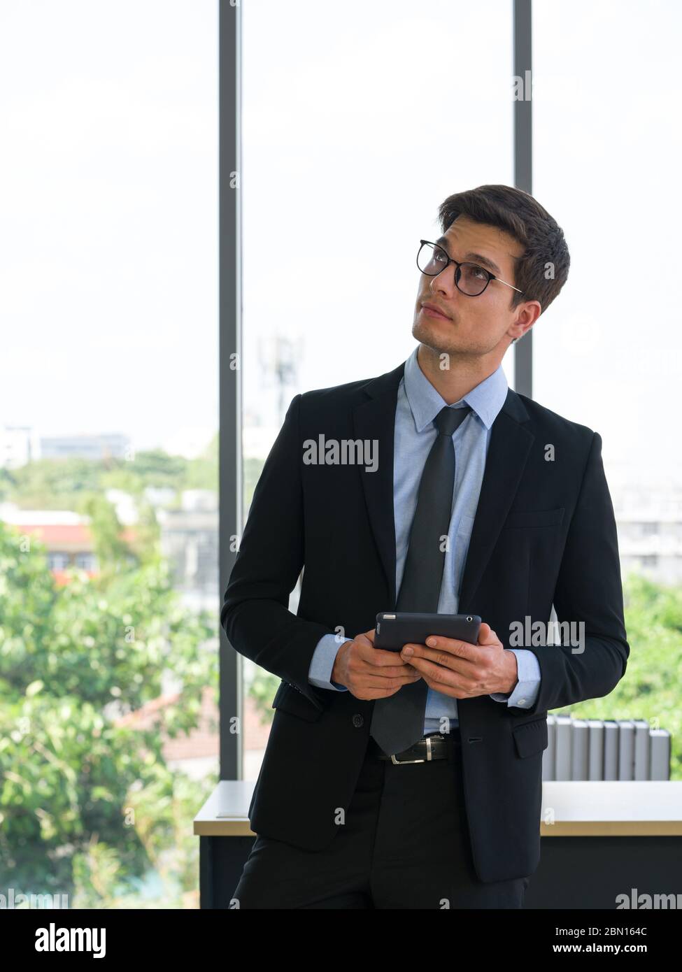 Work computer suits hi-res stock photography and images - Alamy