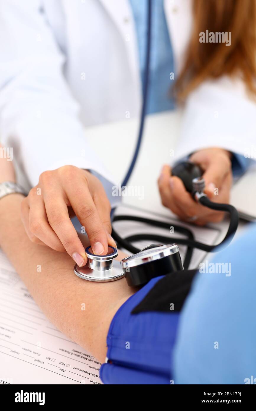Female doctor arms make medic procedure closeup Stock Photo - Alamy