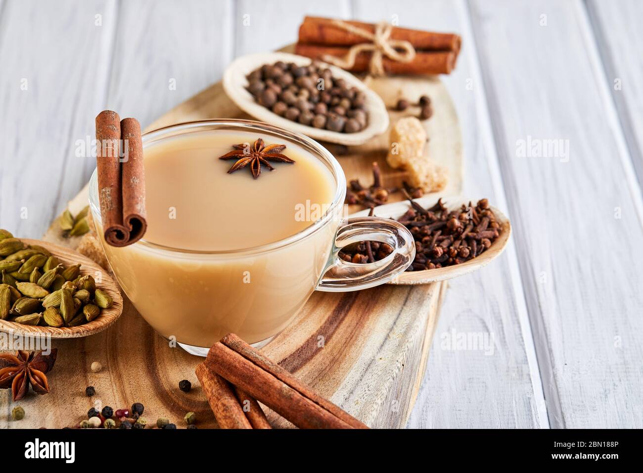 Traditional Indian drink - masala tea with spices. Cinnamon, cardamom ...