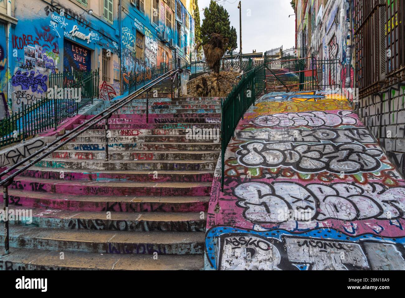 Colorful graffiti and street art at the Escaliers du Cours Julien at Noailles district ...
