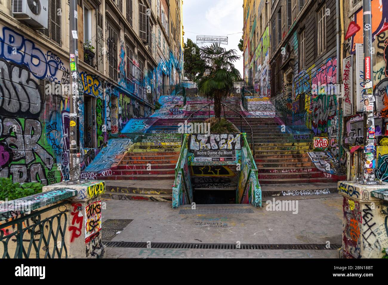 Colorful graffiti and street art at the Escaliers du Cours Julien at Noailles district ...