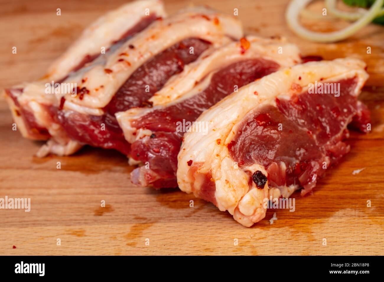 Raw lamb meat ready for grill Stock Photo - Alamy
