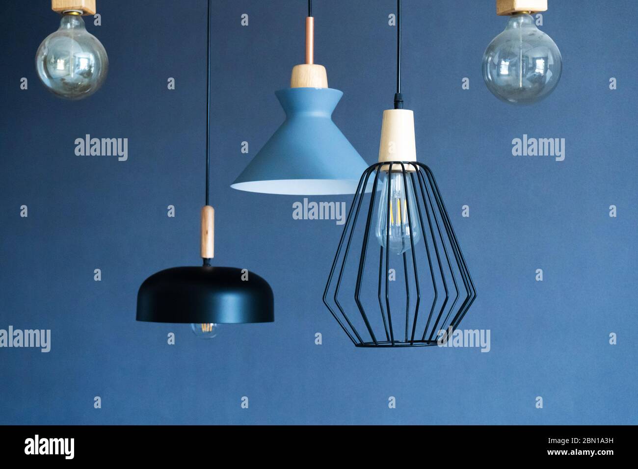 Interior decoration of stylish housing. Loft style incandescent lamp ...