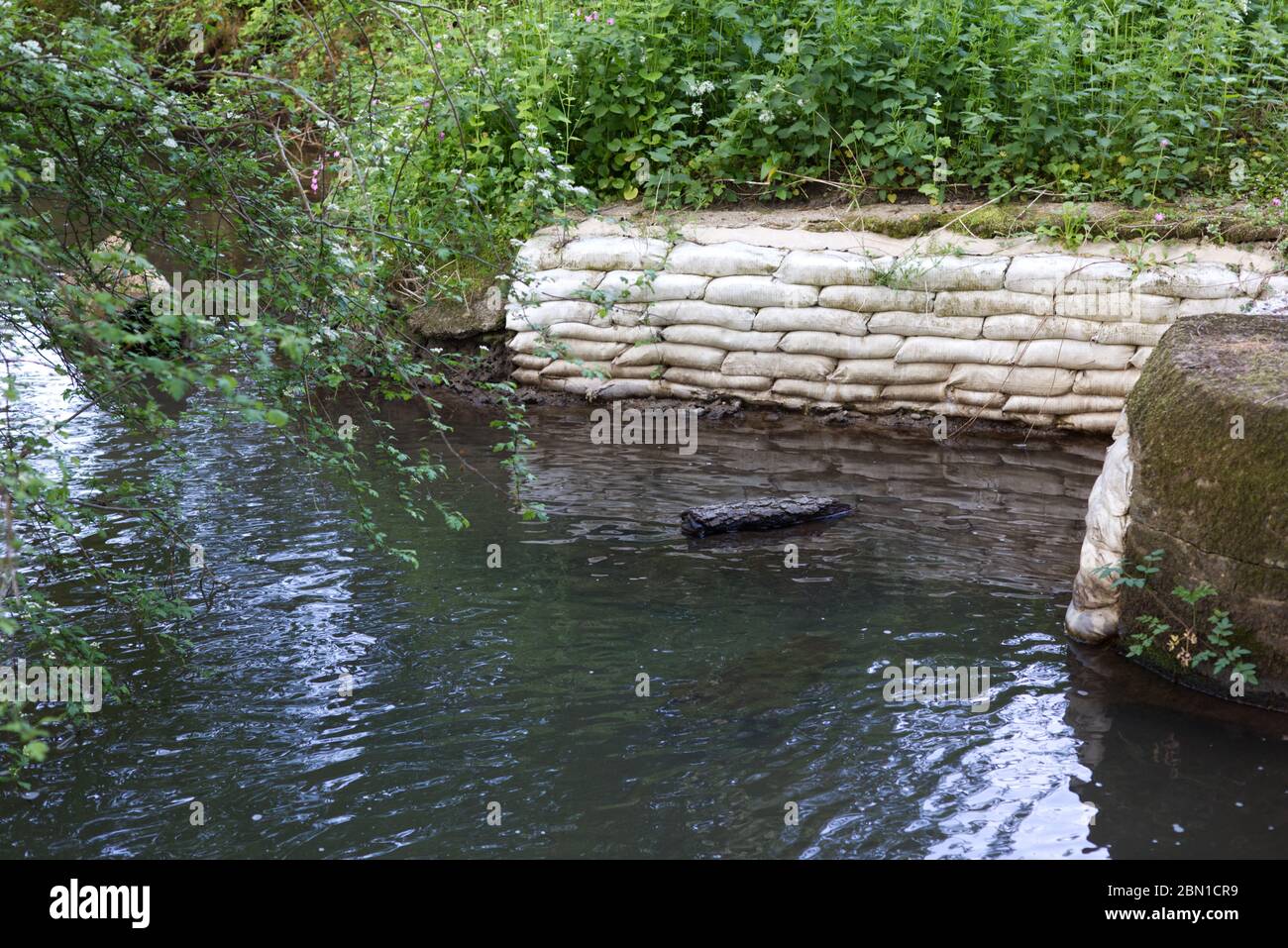 Sandbags holding up a riverbank hi-res stock photography and images - Alamy