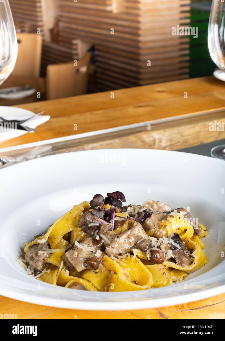 Fresh pappardelle pasta with porcini mushrooms and truffle scent ...