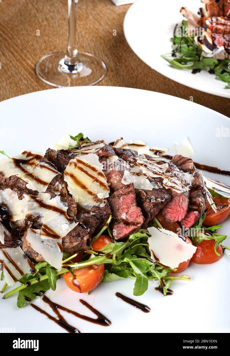 Traditional Italian main dish. Beef tagliata: tender beef rib eye ...