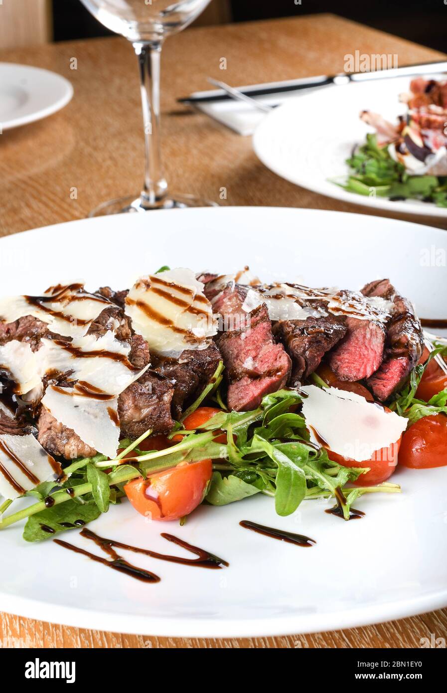 Traditional Italian main dish. Beef tagliata: tender beef rib eye ...