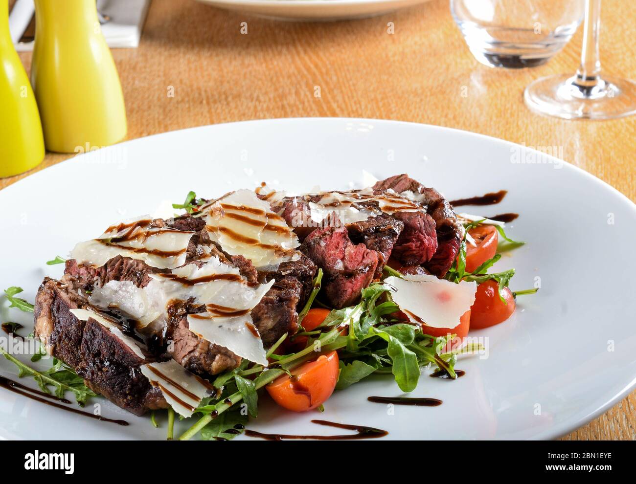 Traditional Italian main dish. Beef tagliata: tender beef rib eye ...
