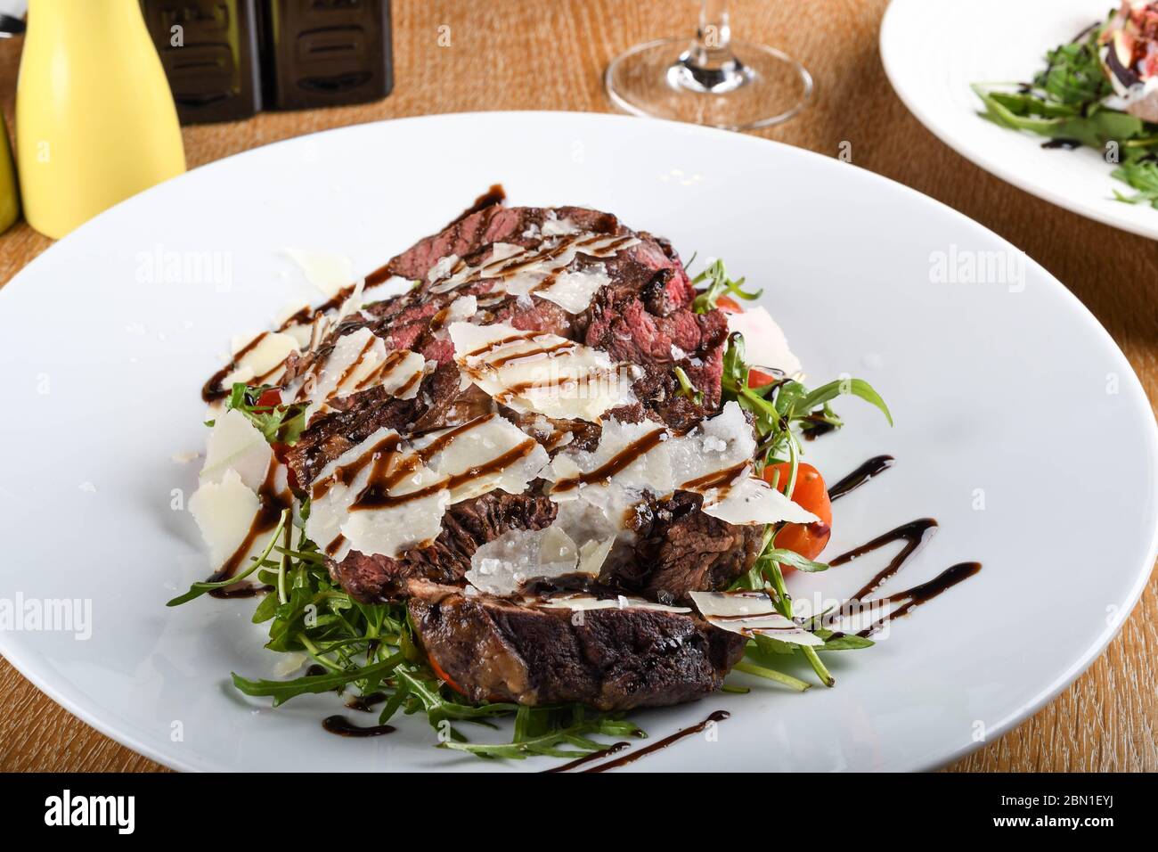 Traditional Italian main dish. Beef tagliata: tender beef rib eye ...
