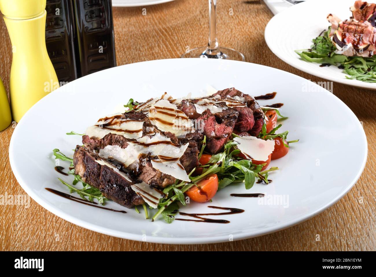 Traditional Italian main dish. Beef tagliata: tender beef rib eye ...