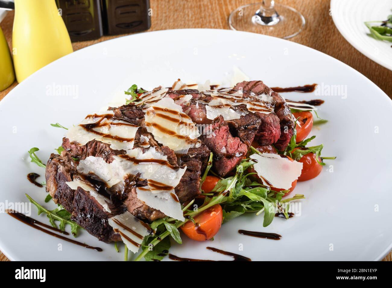 Traditional Italian main dish. Beef tagliata: tender beef rib eye ...
