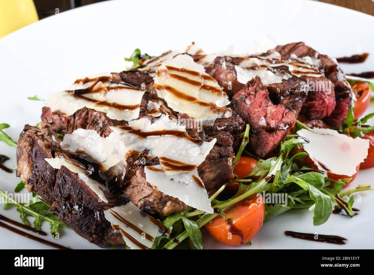 Traditional Italian main dish. Beef tagliata: tender beef rib eye ...