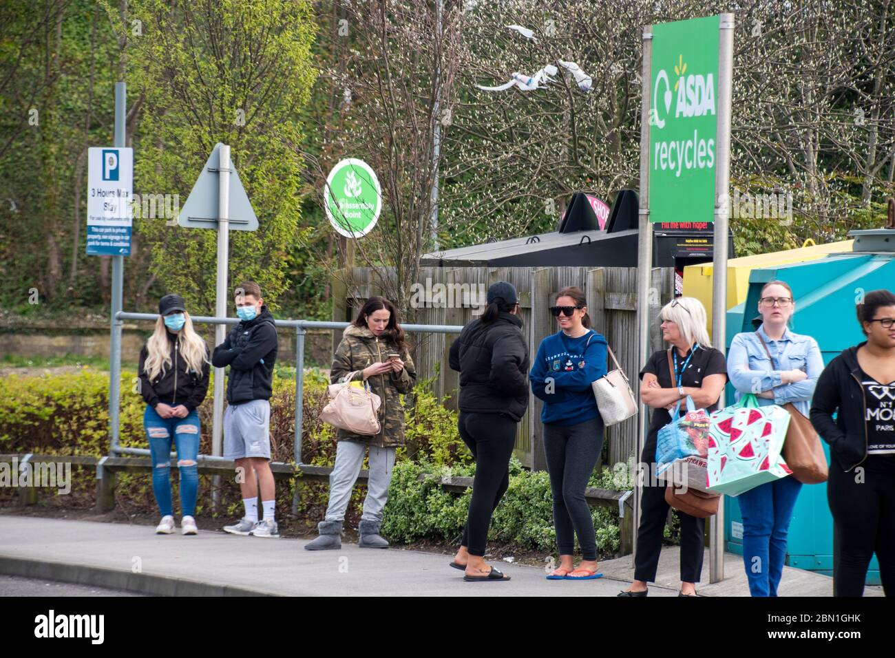 Sheffield UK – April 09 2020: Long socially distanced queue at Asda ...