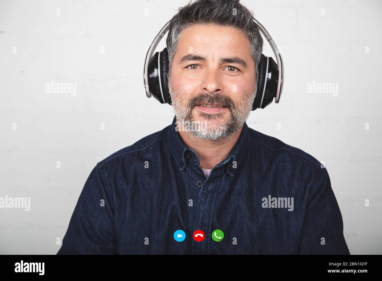 man chatting in a video call on a technology platform during quarantine ...