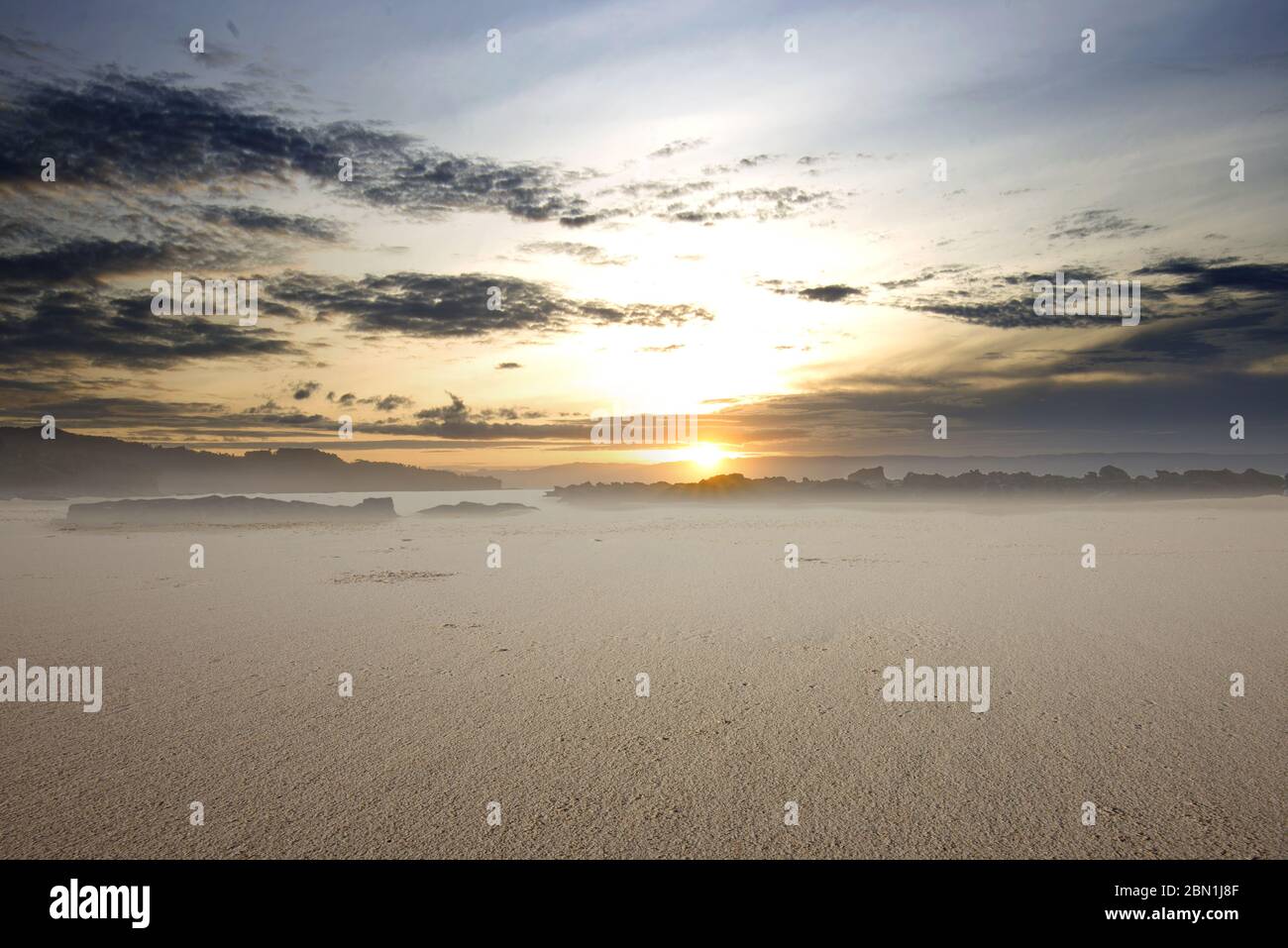 Views of sand dune with a sunset sky background Stock Photo - Alamy