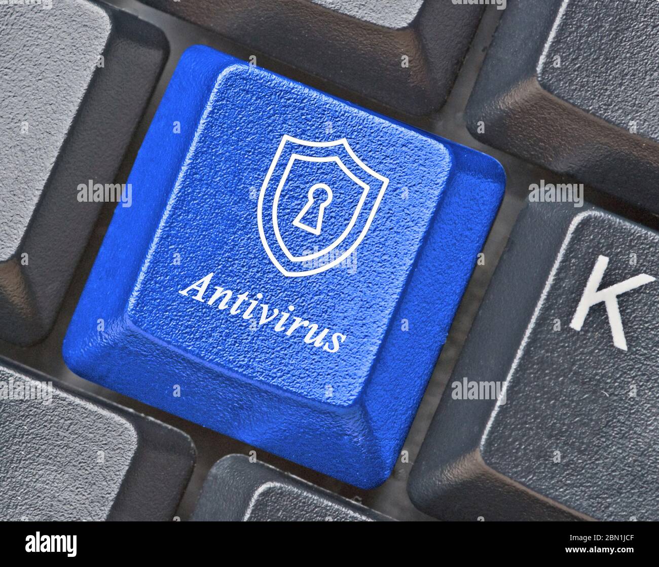 Keyboard with key for antivirus Stock Photo - Alamy
