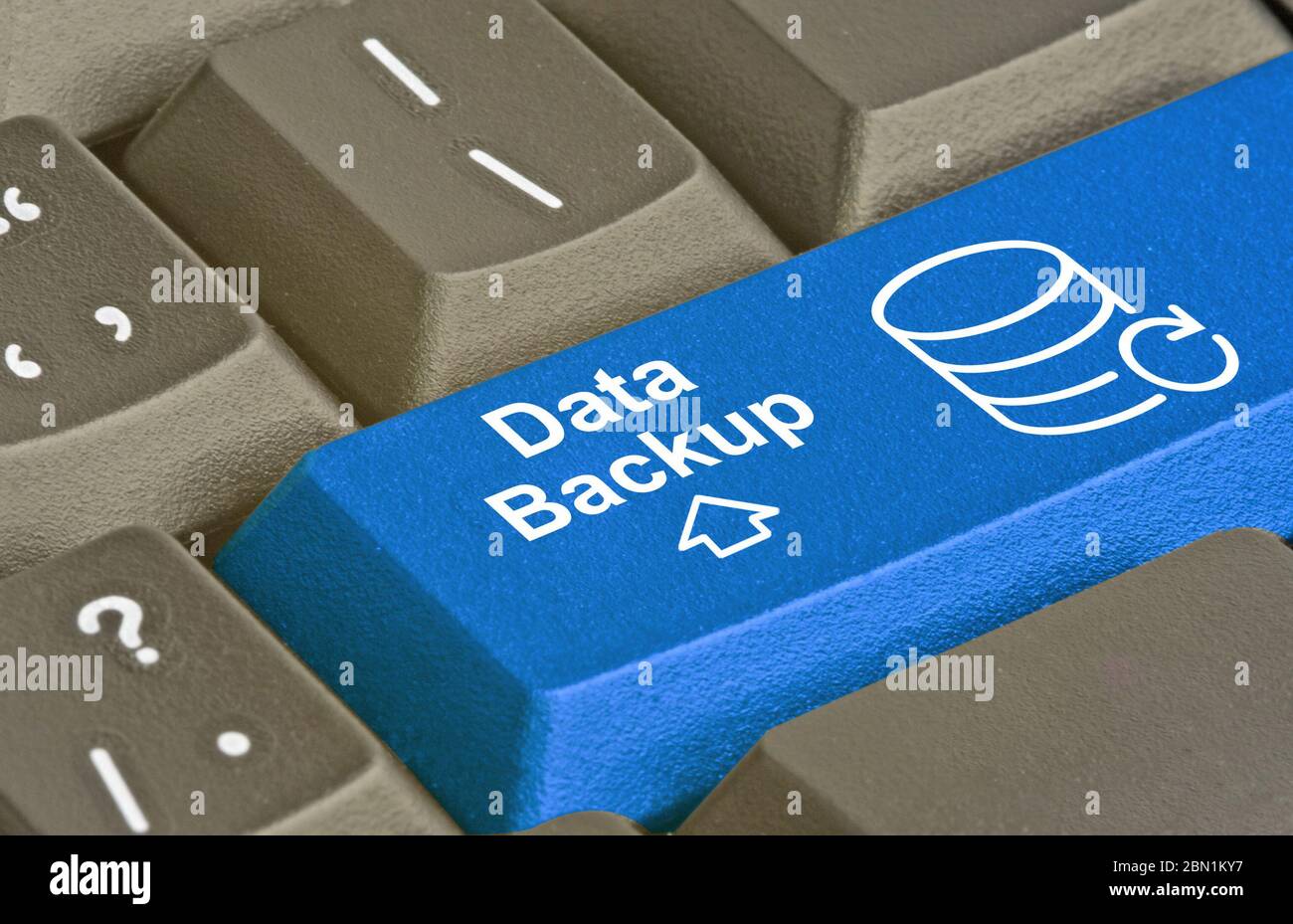 Blue key for data backup Stock Photo - Alamy