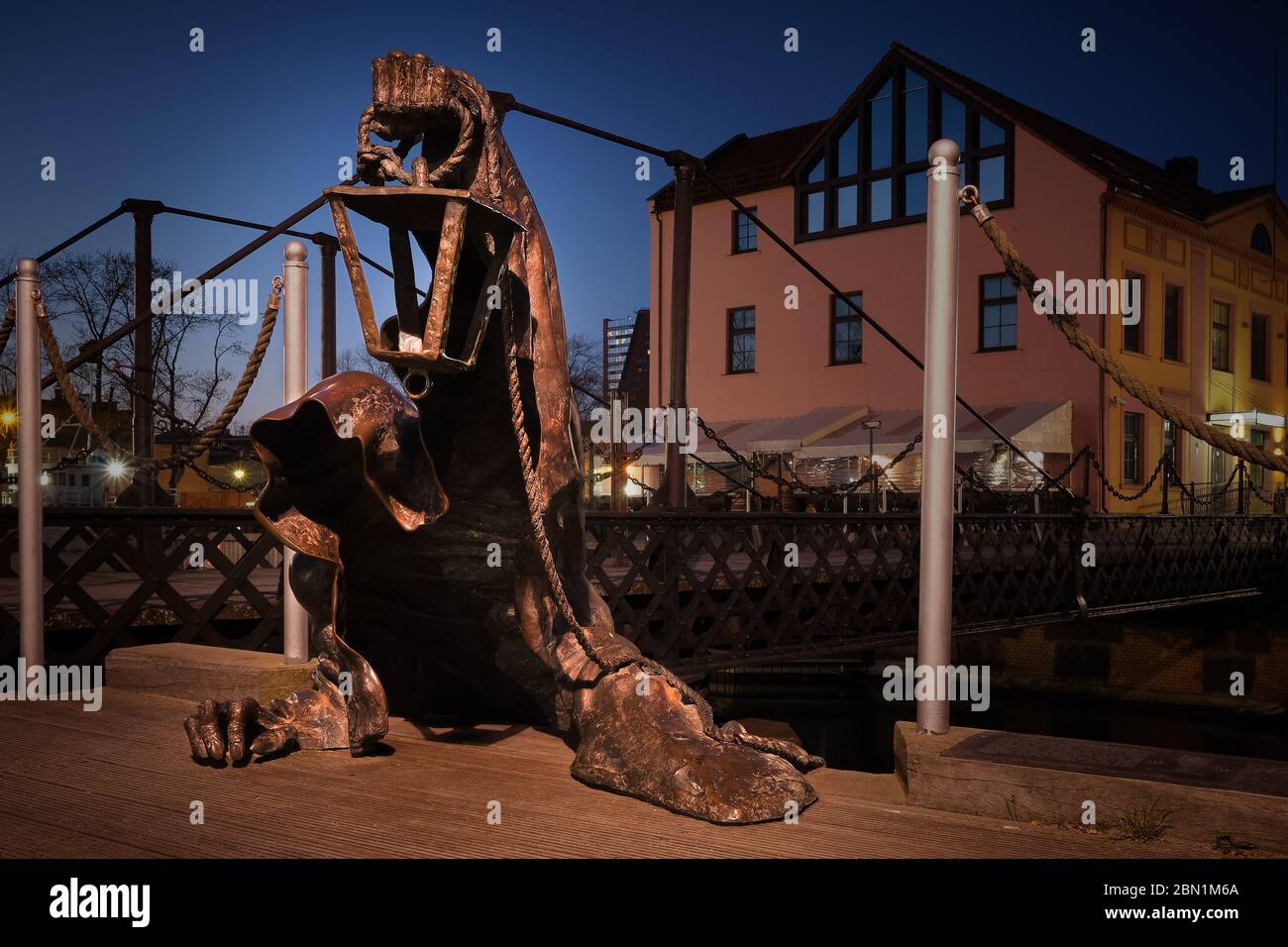 City attraction metal statue in old port of Klaipeda, Lithuania. Legend ...