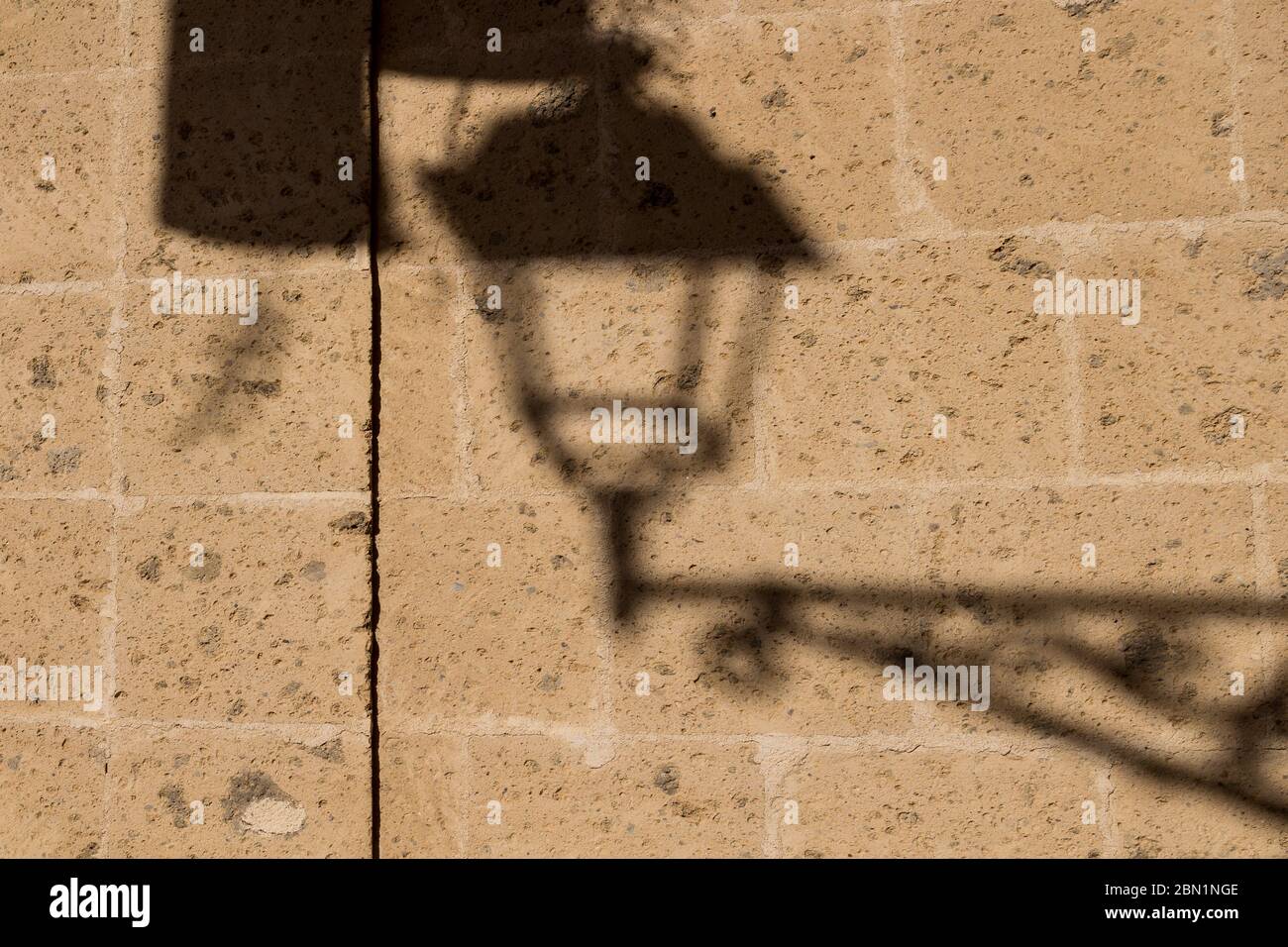 Shadow brick blocks from the wall as a background hi-res stock ...