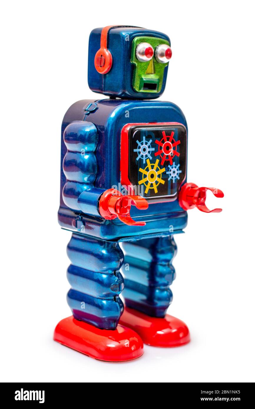Vintage tin robot toy isolated on a white background Stock Photo - Alamy