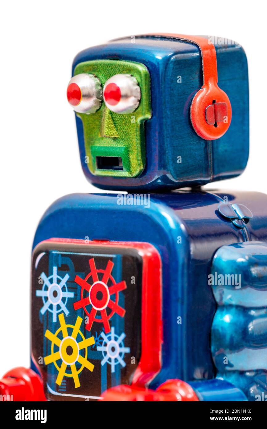 Vintage tin robot toy isolated on a white background Stock Photo - Alamy