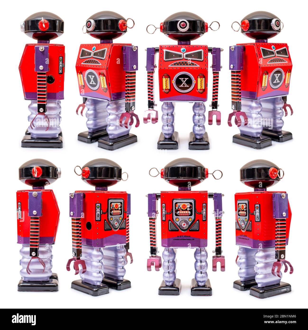 Vintage tin robot toy isolated on a white background Stock Photo - Alamy