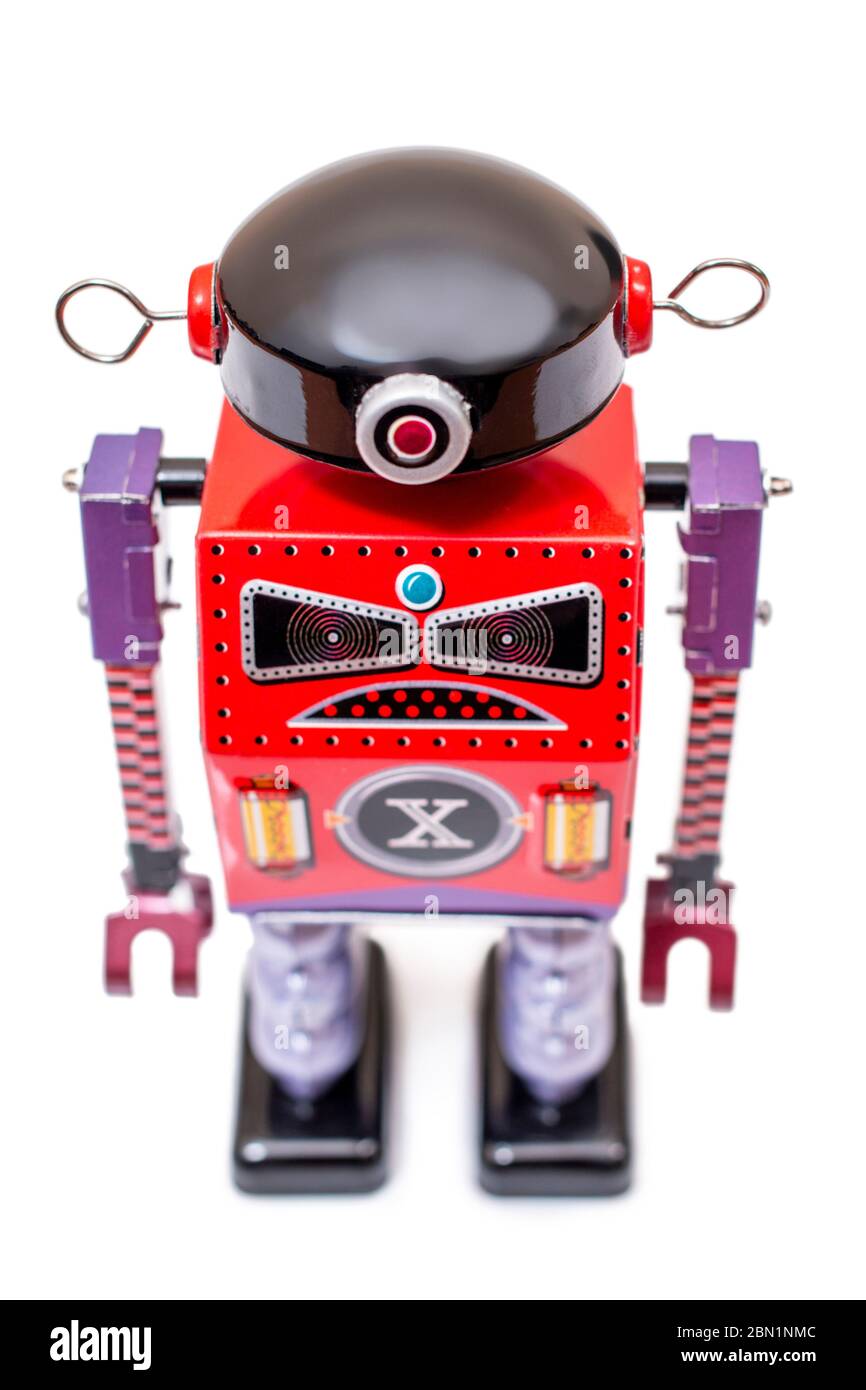 Vintage tin robot toy isolated on a white background Stock Photo - Alamy