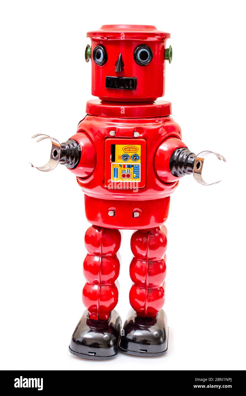 Vintage tin robot toy isolated on a white background Stock Photo - Alamy