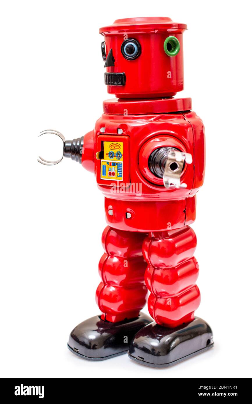 Vintage tin robot toy isolated on a white background Stock Photo - Alamy