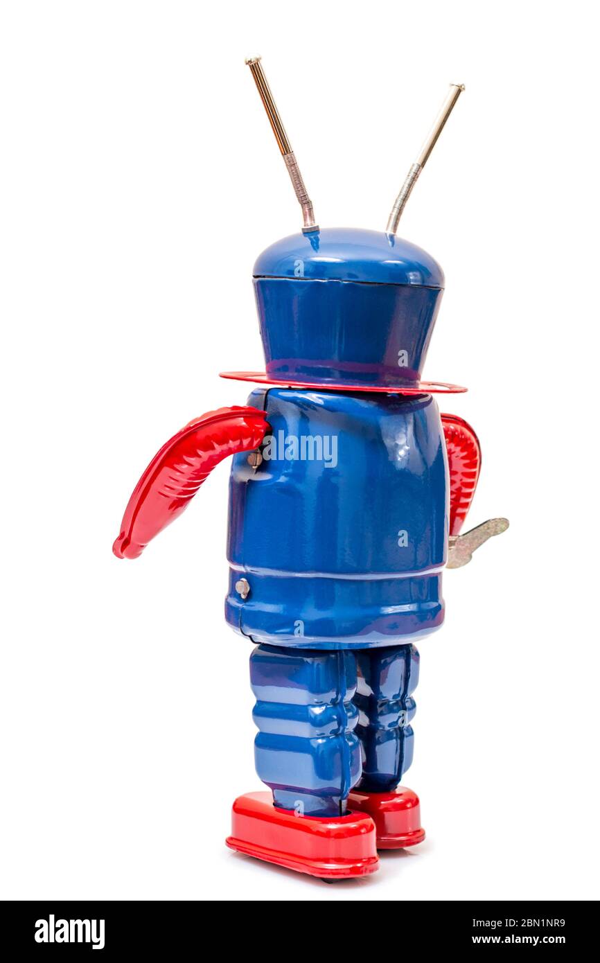 Vintage tin robot toy isolated on a white background Stock Photo - Alamy