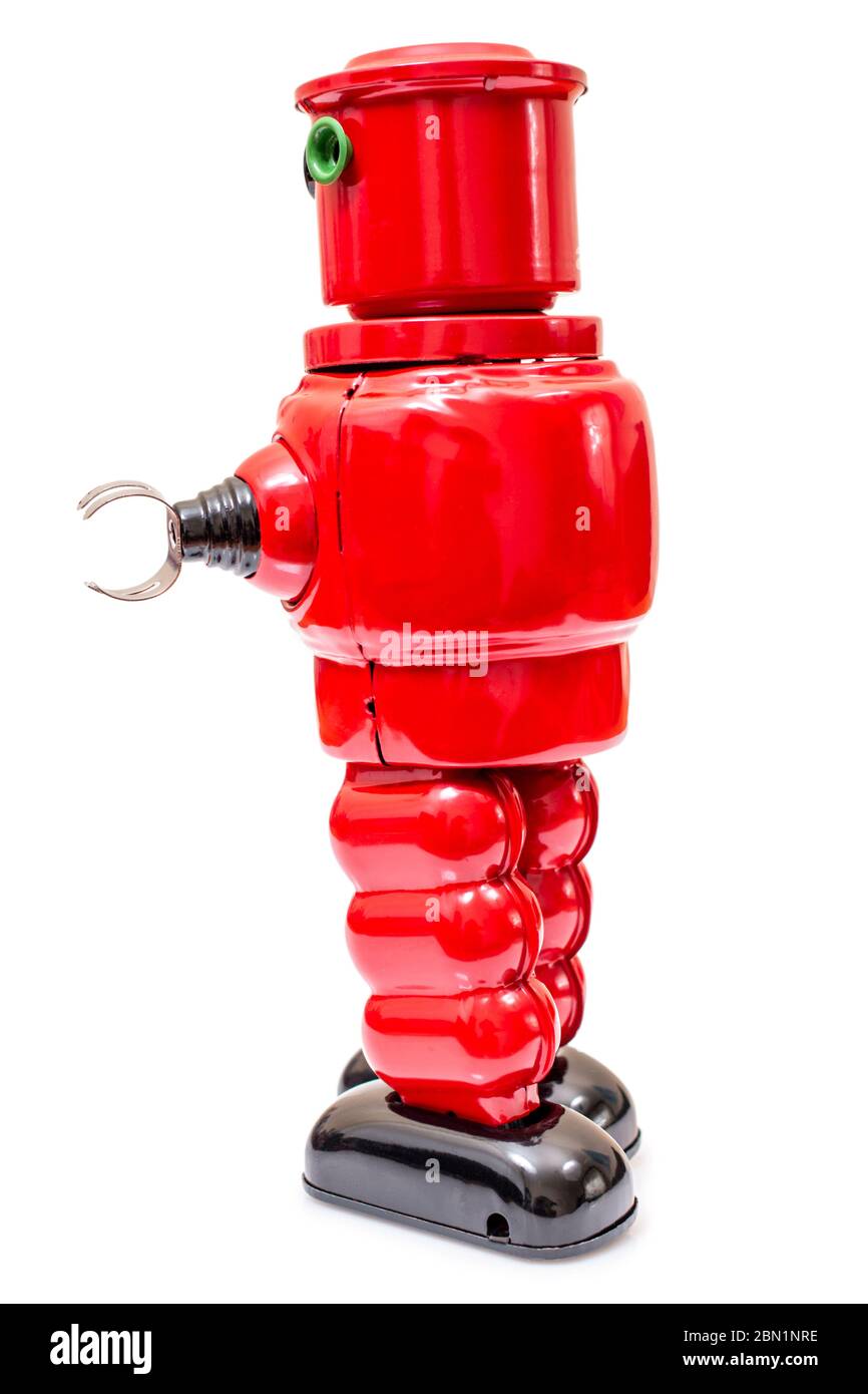 Vintage tin robot toy isolated on a white background Stock Photo - Alamy