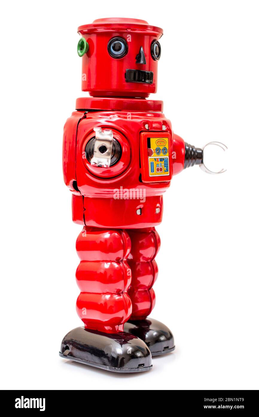 Vintage tin robot toy isolated on a white background Stock Photo - Alamy