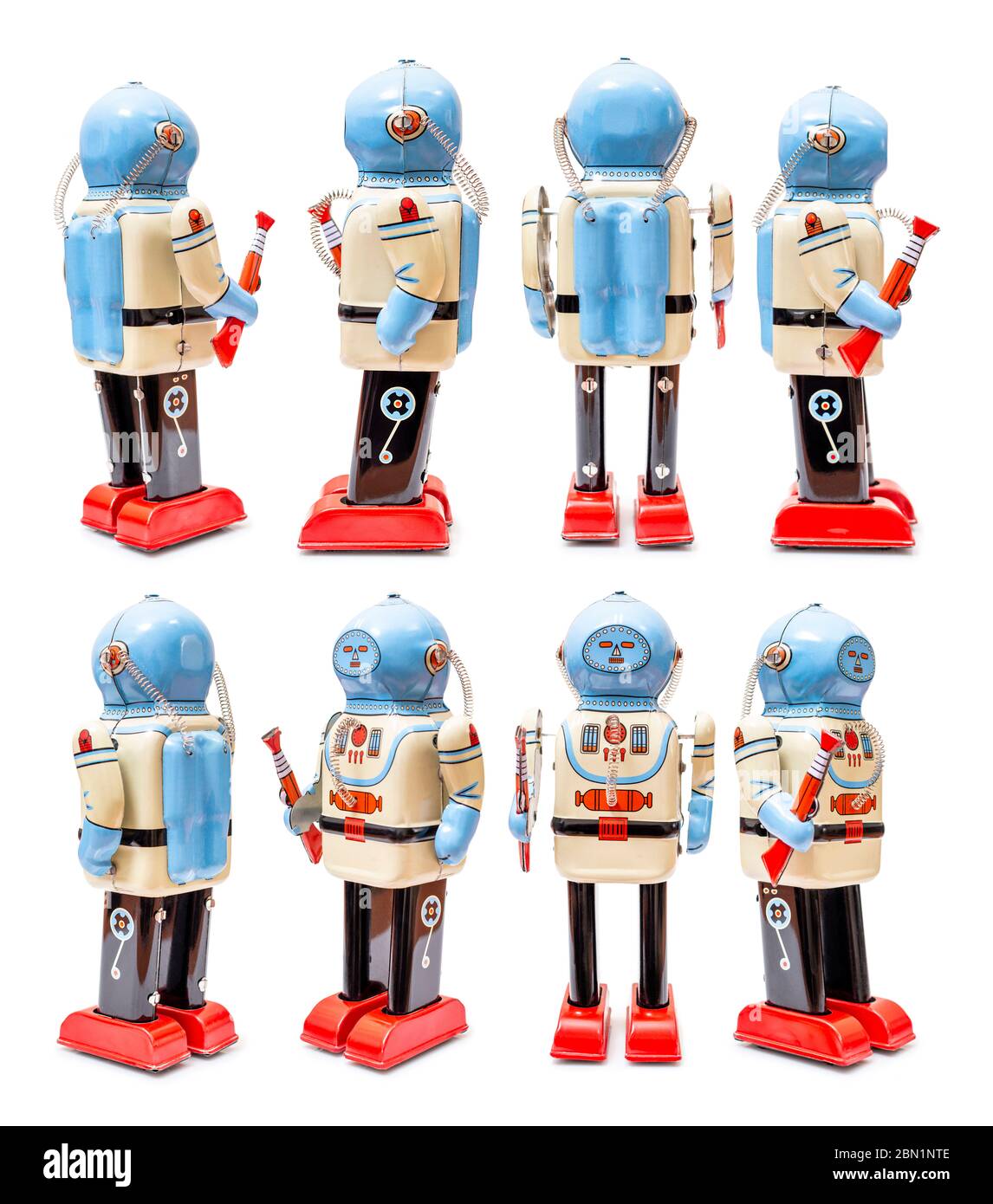 Vintage tin robot toy isolated on a white background Stock Photo - Alamy