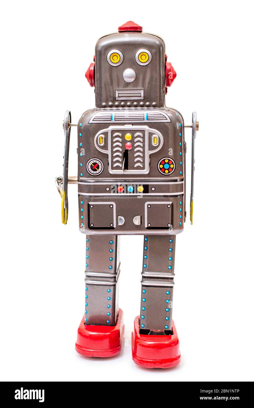 Vintage tin robot toy isolated on a white background Stock Photo - Alamy