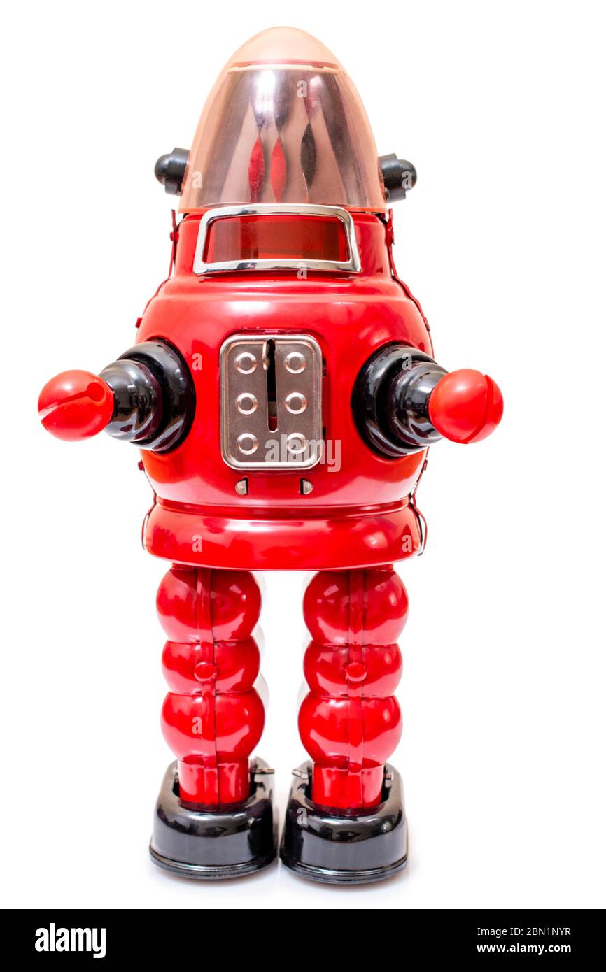 Vintage tin robot toy isolated on a white background Stock Photo - Alamy