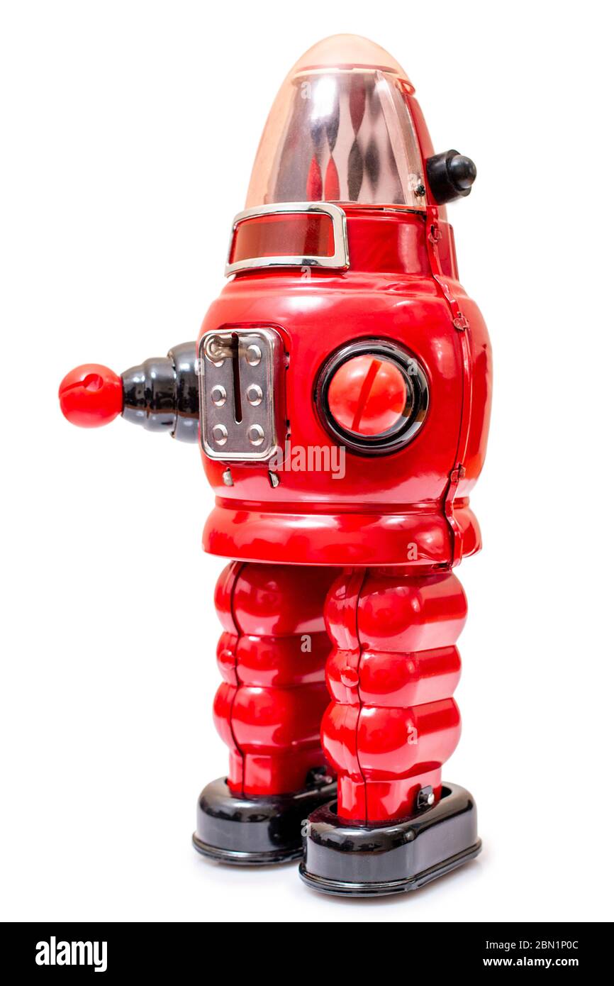Vintage tin robot toy isolated on a white background Stock Photo - Alamy