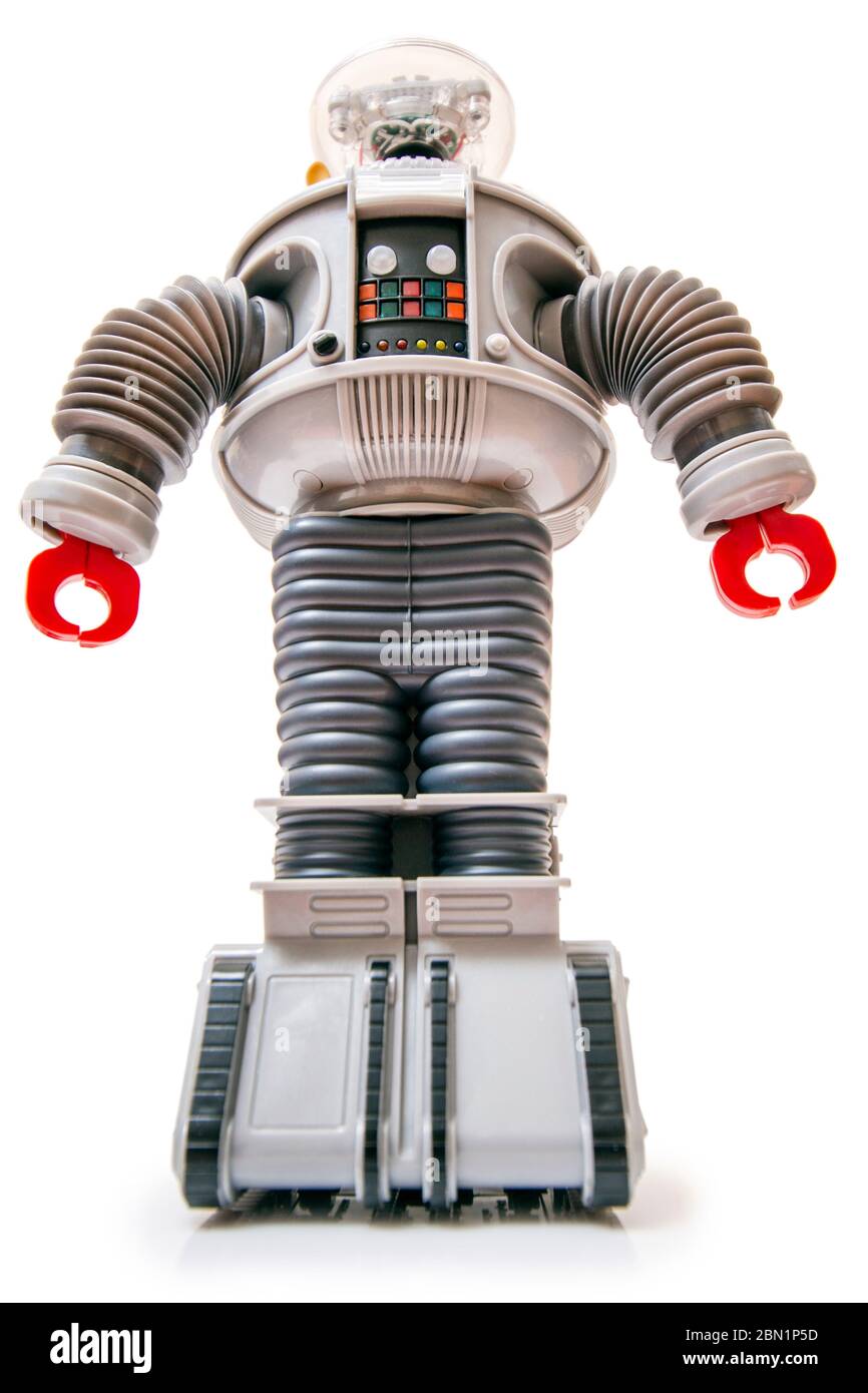 Vintage tin robot toy isolated on a white background Stock Photo - Alamy