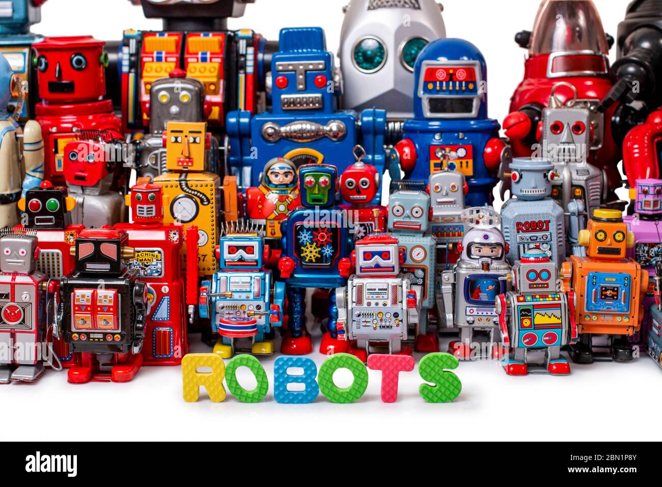 Close up view of colorful mixed vintage tin robot toys collection with ...