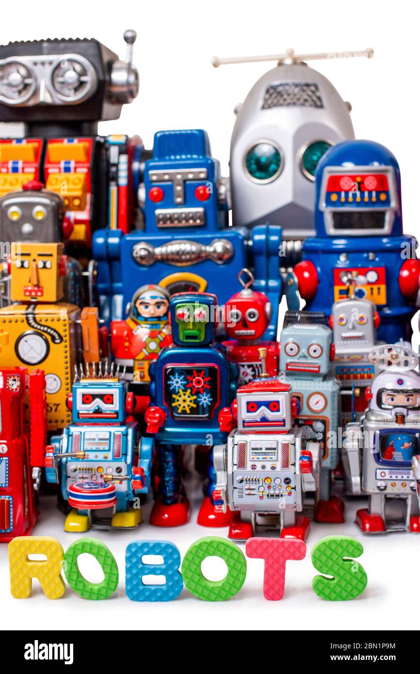 Close up view of colorful mixed vintage tin robot toys collection with ...