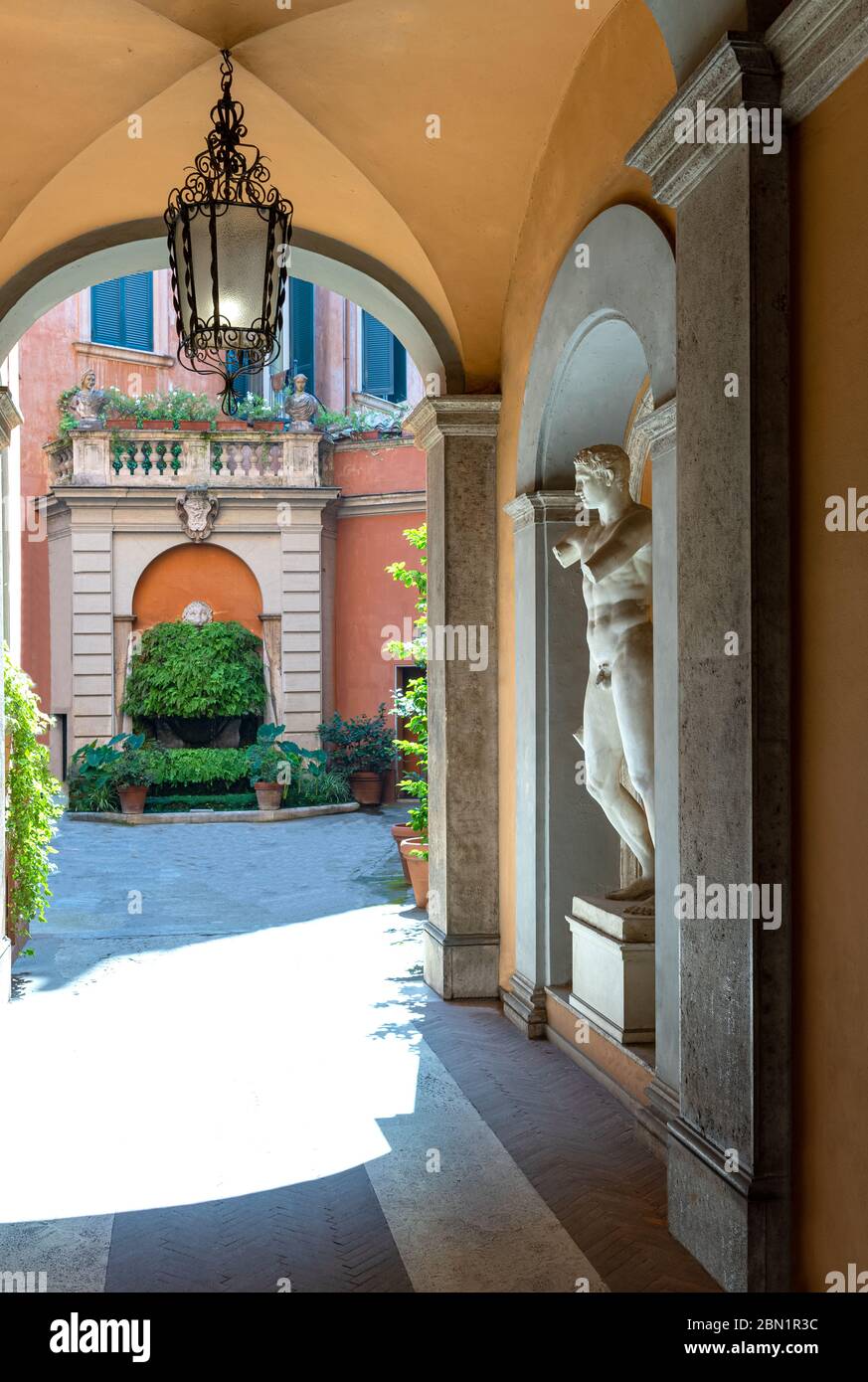 Rome, Italy - June 19, 2019: The classic entrance and courtyard of an ...