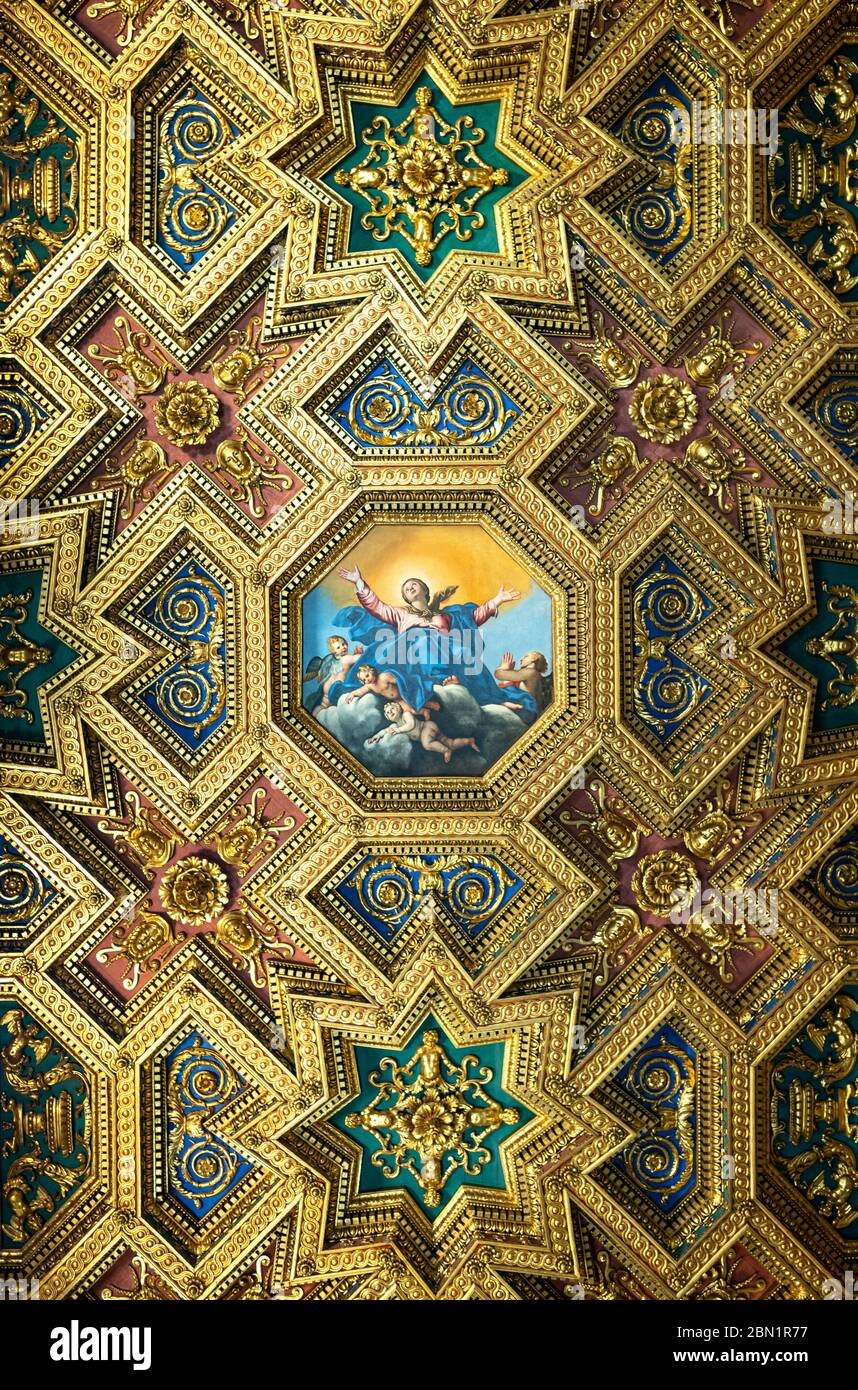 Rome, Italy - June 18, 2019: The golden wooden ceiling of the Basilica ...